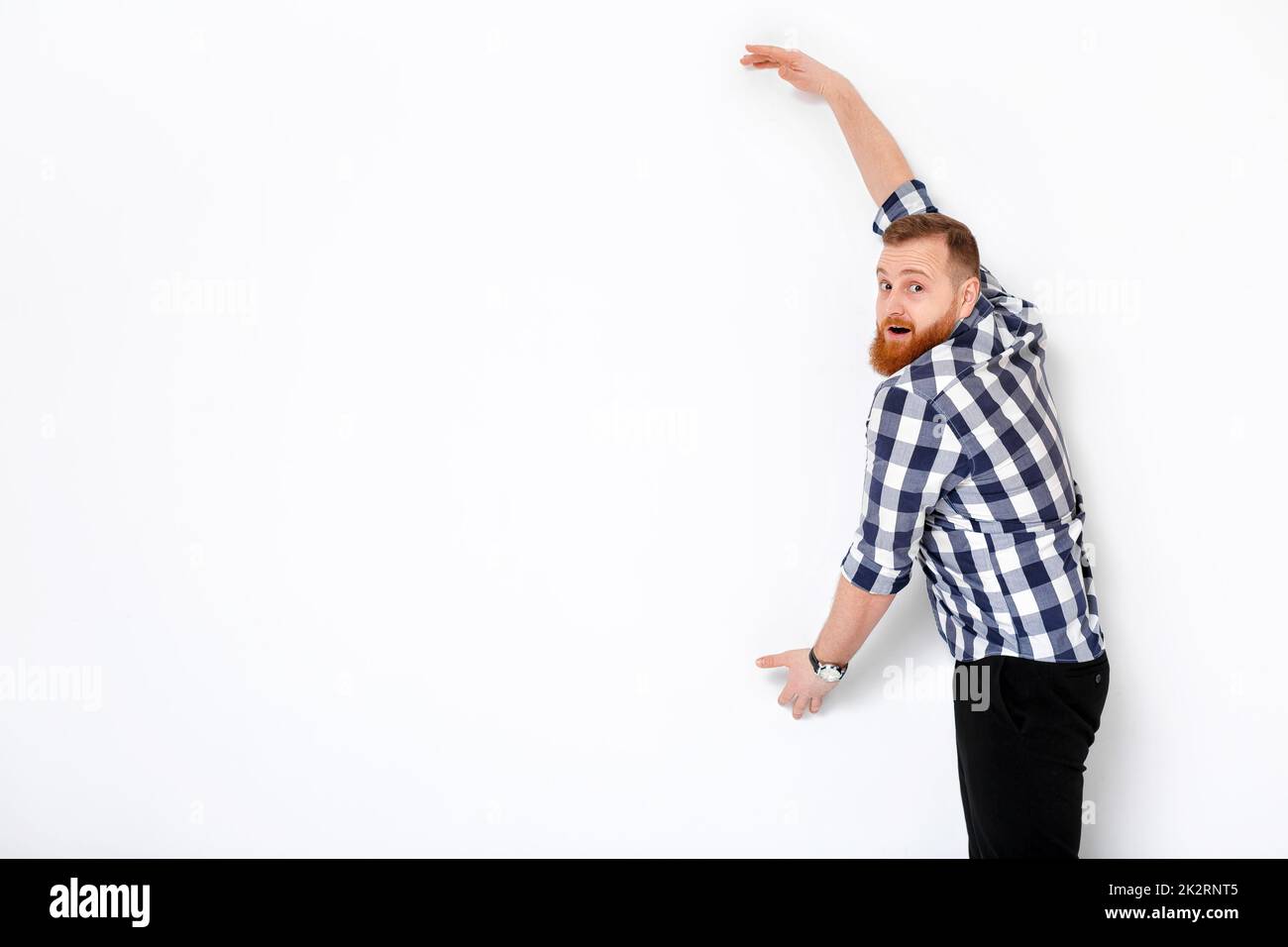 Young man pointing beard hi-res stock photography and images - Alamy