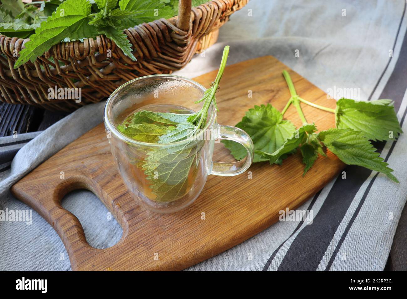 Nettle tea. Fresh and dry stinging nettle. Folk remedy. The source of ...