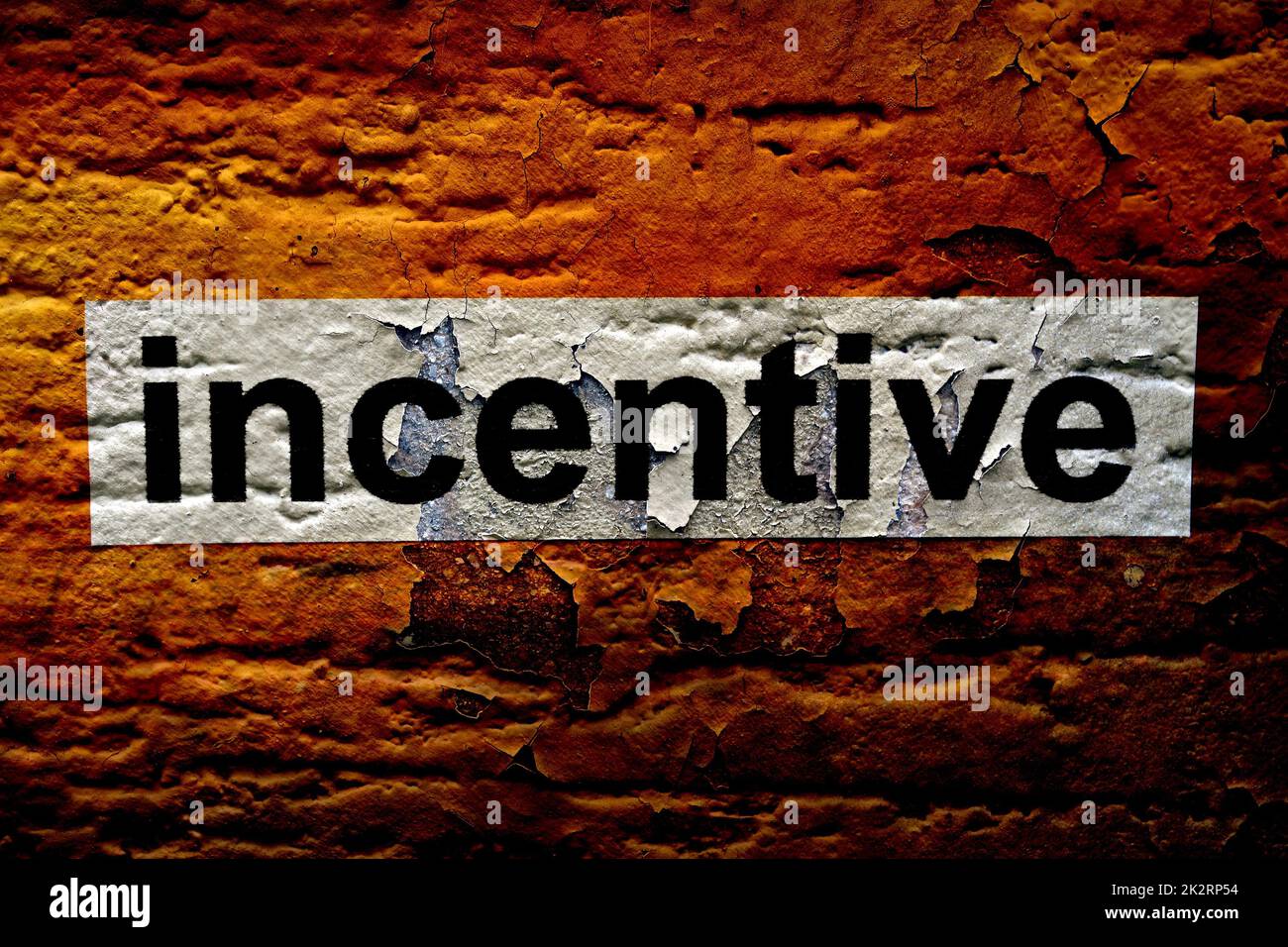 Incentive text on grunge background Stock Photo - Alamy