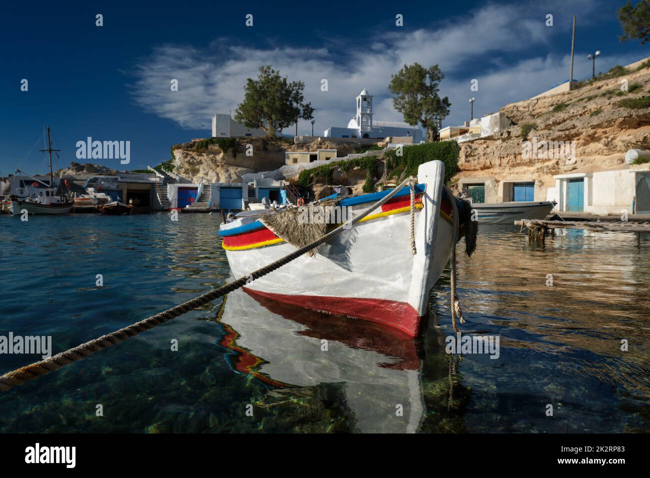 Fishing boats in harbour in fishing village of Mandrakia, Milos island ...