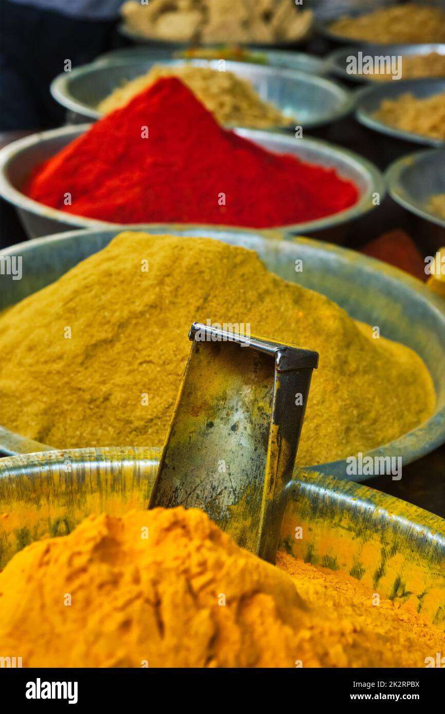 Turmeric curcuma powder and chili powder in spices market in India ...