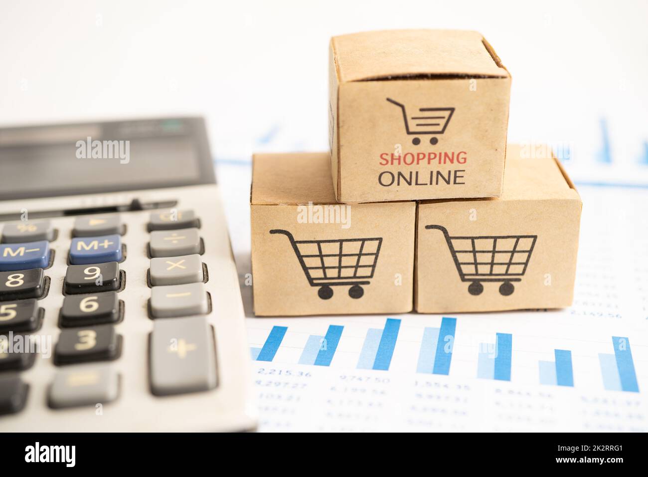 Shopping online box with credit card and calculator on graph. Finance ...