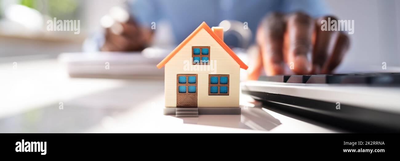 Businessman's Hand Calculating Invoice Stock Photo - Alamy