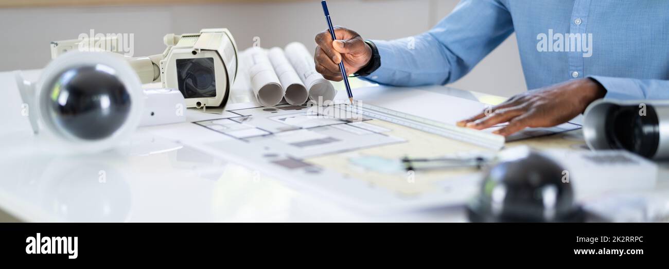 Close-up Of An Architect's Hand Drawing Blueprint Stock Photo - Alamy