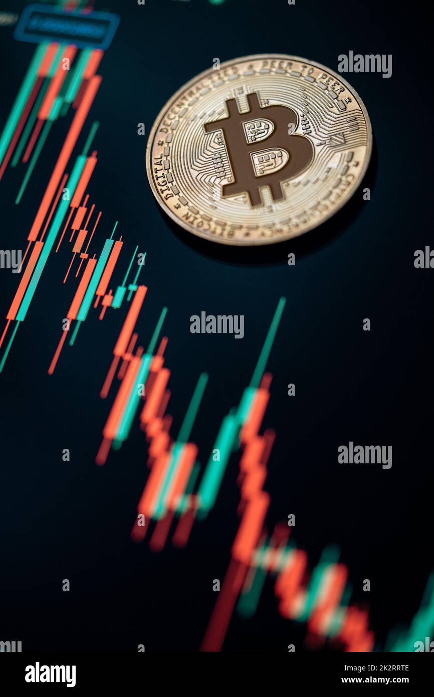 Silver Bitcoin with candle stick graph chart and digital background ...