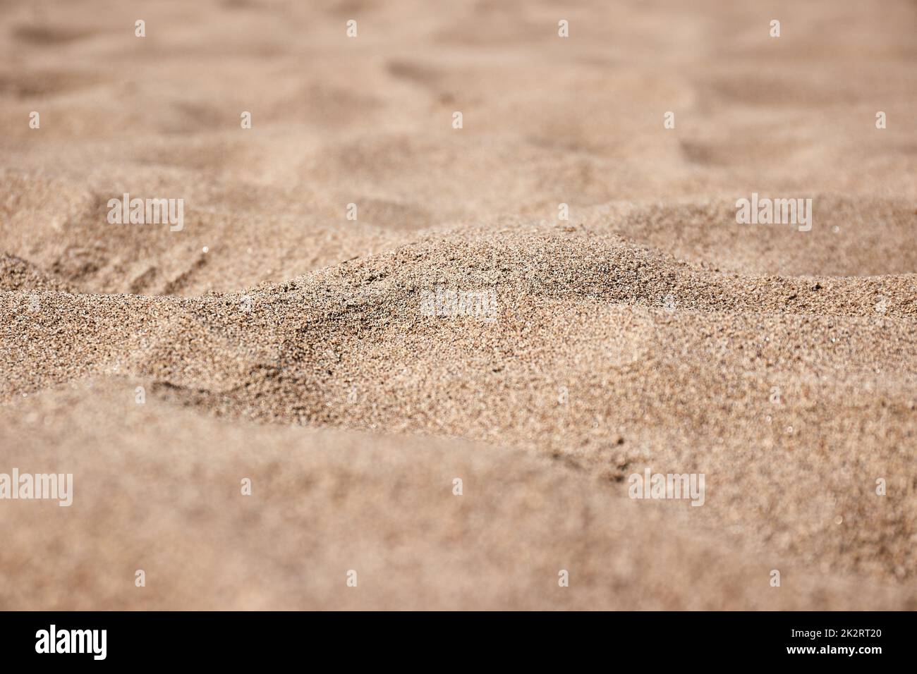 Sand of a beach Stock Photo - Alamy
