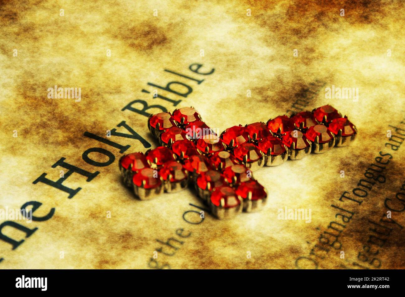 Red cross on Holy Bible Stock Photo - Alamy