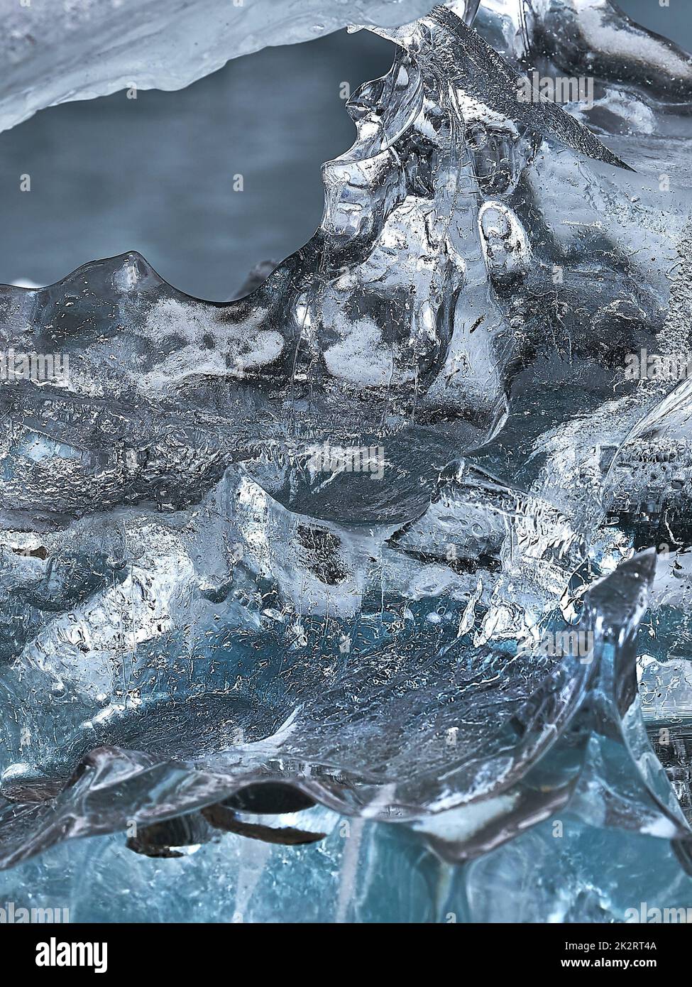 Block of glacier ice strange shaped Stock Photo - Alamy