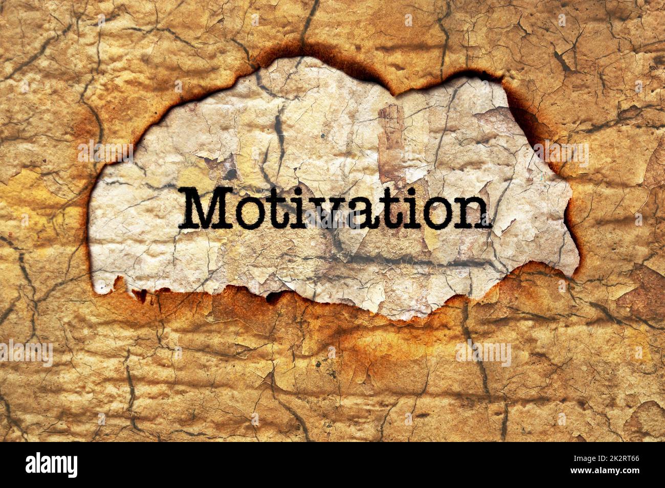 Motivation text on paper hole Stock Photo - Alamy