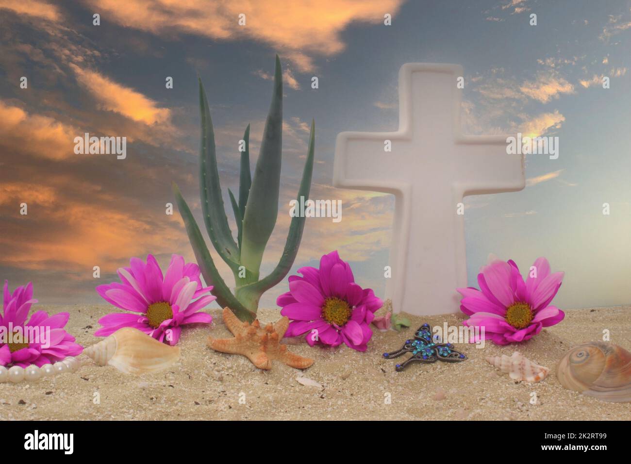 Sea Shells and Flower on Sand With Cross Stock Photo - Alamy
