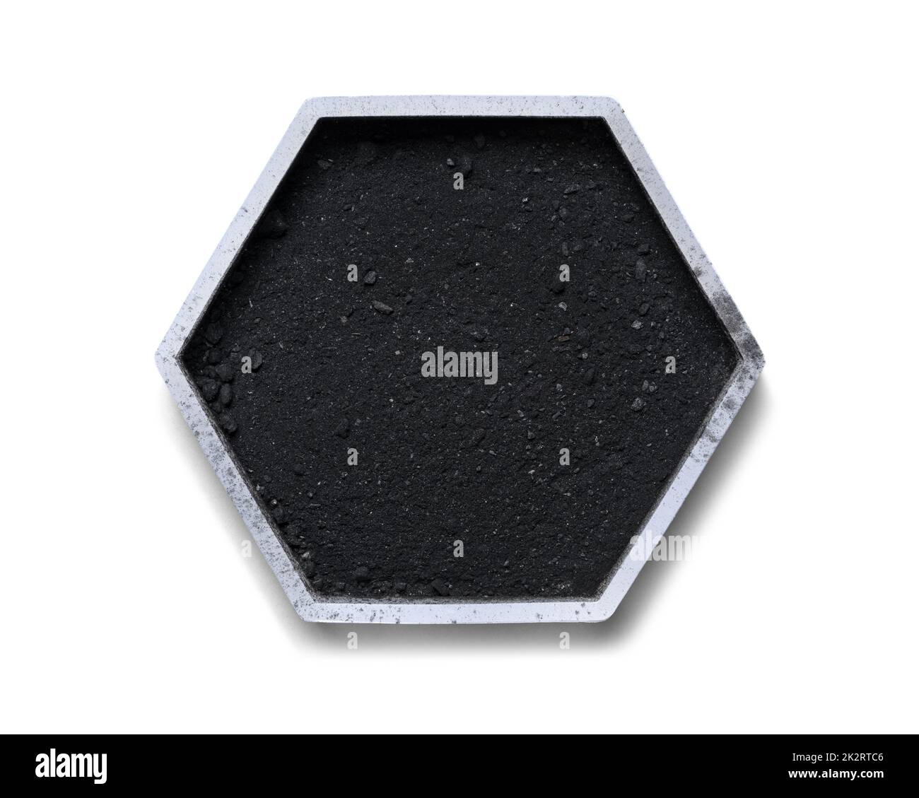 Carbon Charcoal Powder in hexagonal molecular shaped container on white background Stock Photo ...