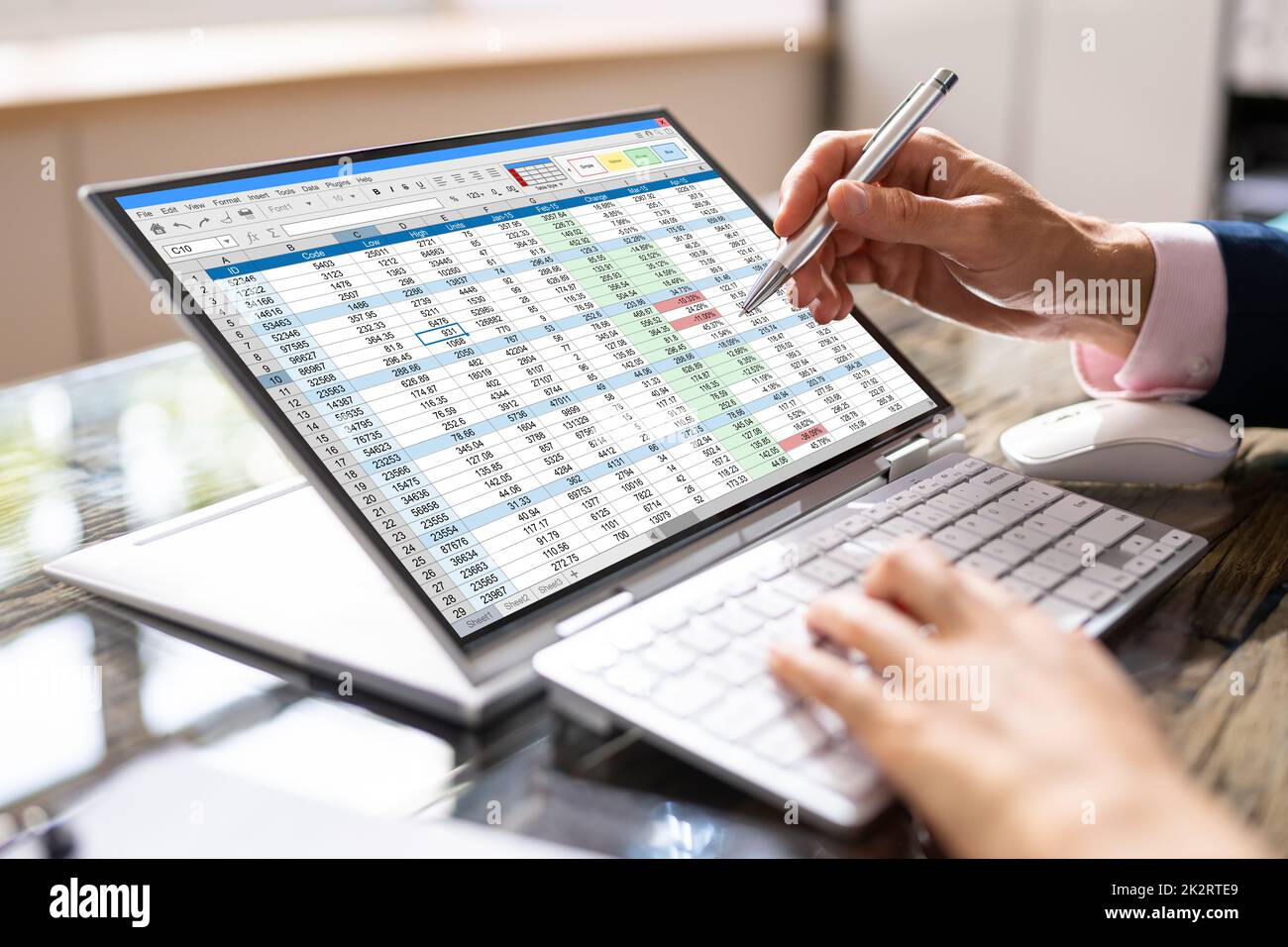 Analyst Employee Working On Spreadsheet Stock Photo - Alamy