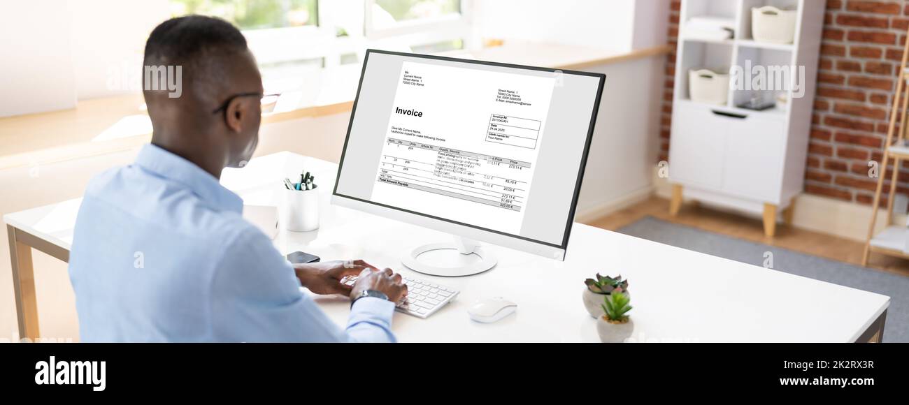 Businessperson Calculating E-Invoice Stock Photo - Alamy