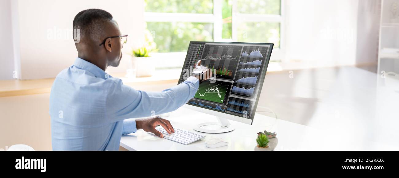 Analyzing financial data african hi-res stock photography and images ...