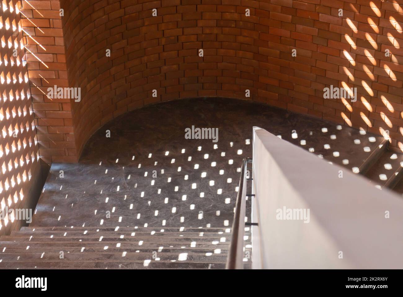 Brick wall trough to see light Stock Photo - Alamy