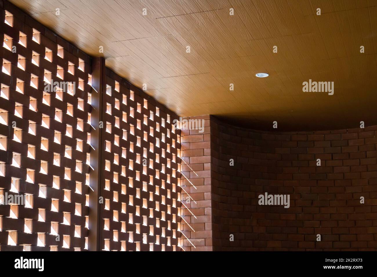 Brick wall trough to see light Stock Photo - Alamy