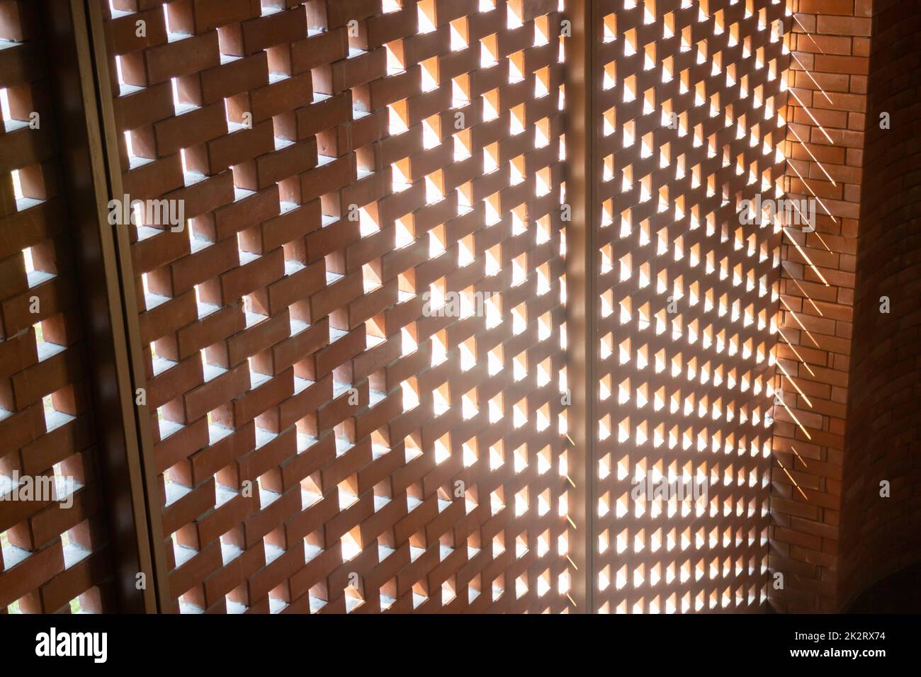 Brick wall trough to see light Stock Photo - Alamy