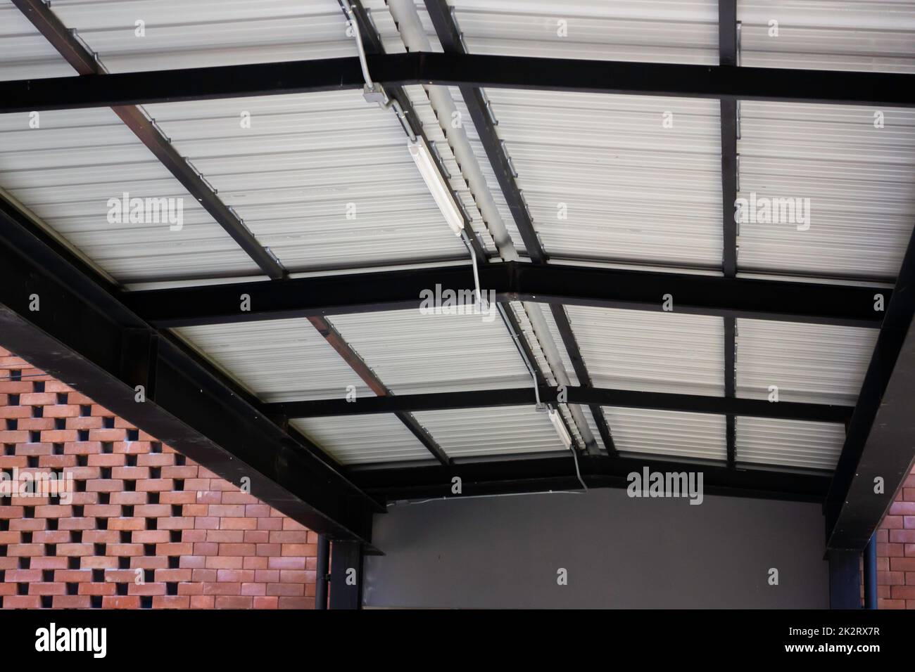 Brick wall trough to see light Stock Photo - Alamy