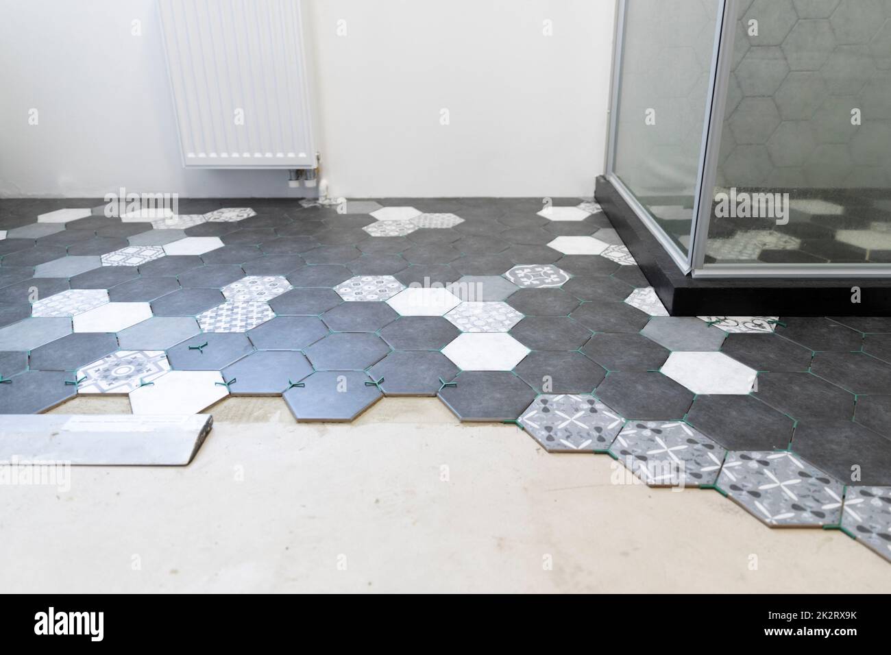 House improvement, different type of tiles on the floor in a bathroom ...