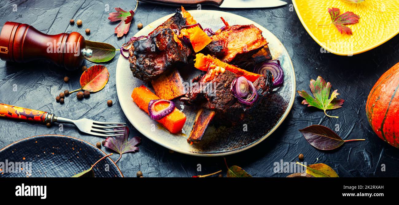 Grilled meat with autumn pumpkin Stock Photo - Alamy