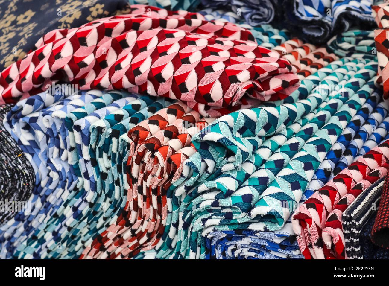 Detailed close up view on samples of cloth and fabrics in different ...