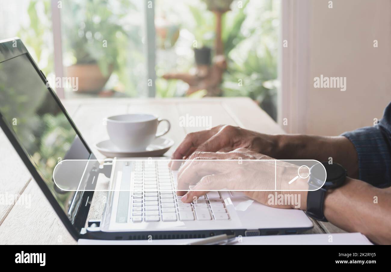 Business man searching and working with computer laptop on table at ...