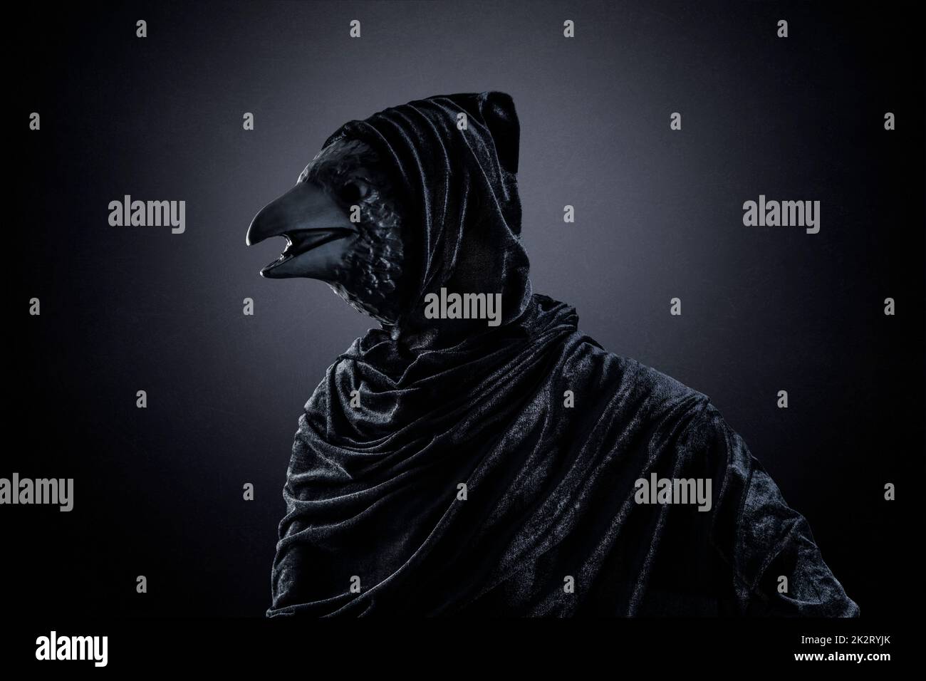 Hooded figure dark cloak mysterious hi-res stock photography and images ...