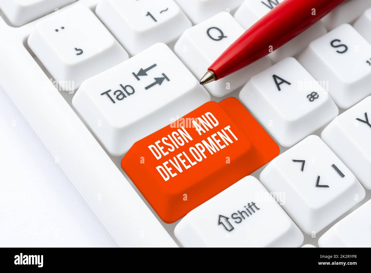 Handwriting text Design And Development. Word Written on Defining the ...