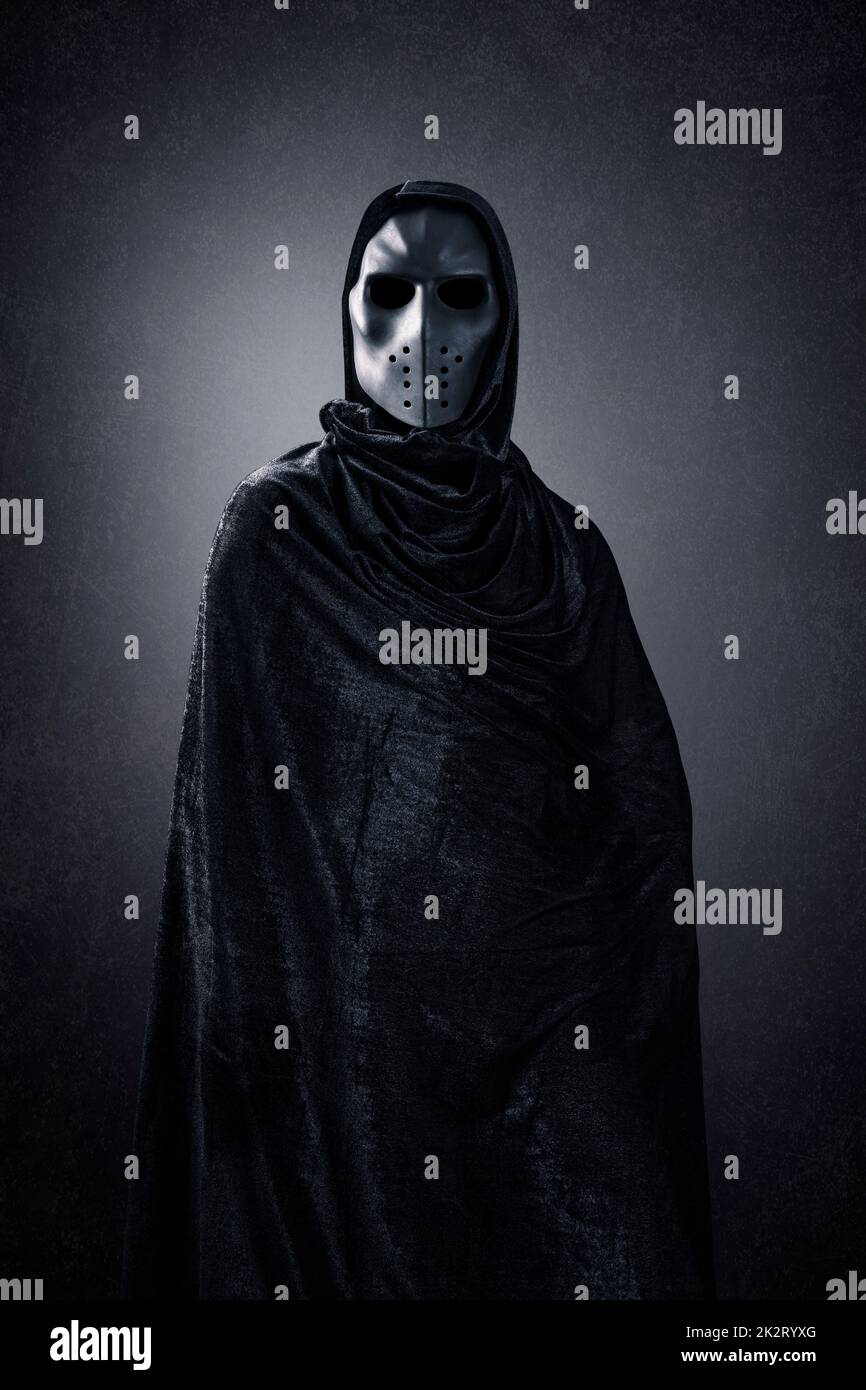 Mysterious humanoid alien at night over dark misty background Stock ...