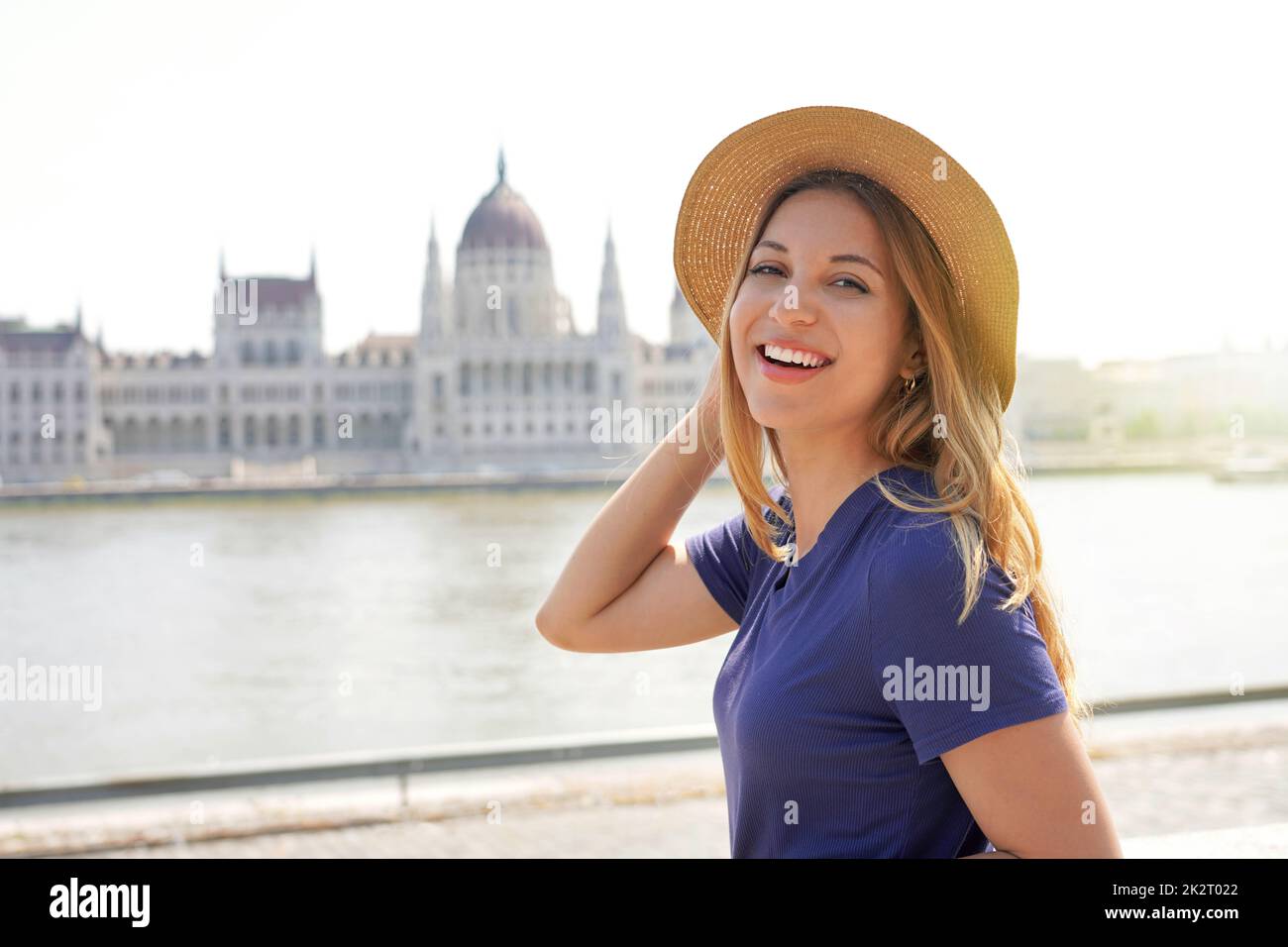 Tourism in Europe. Portrait of beautiful smiling tourist woman visiting ...