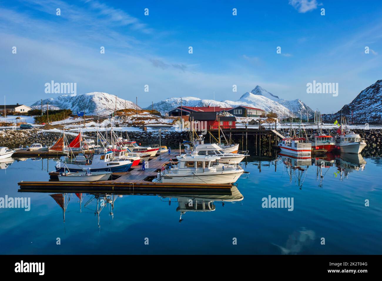 Fishing boats and yachts on pier in Norway Stock Photo - Alamy