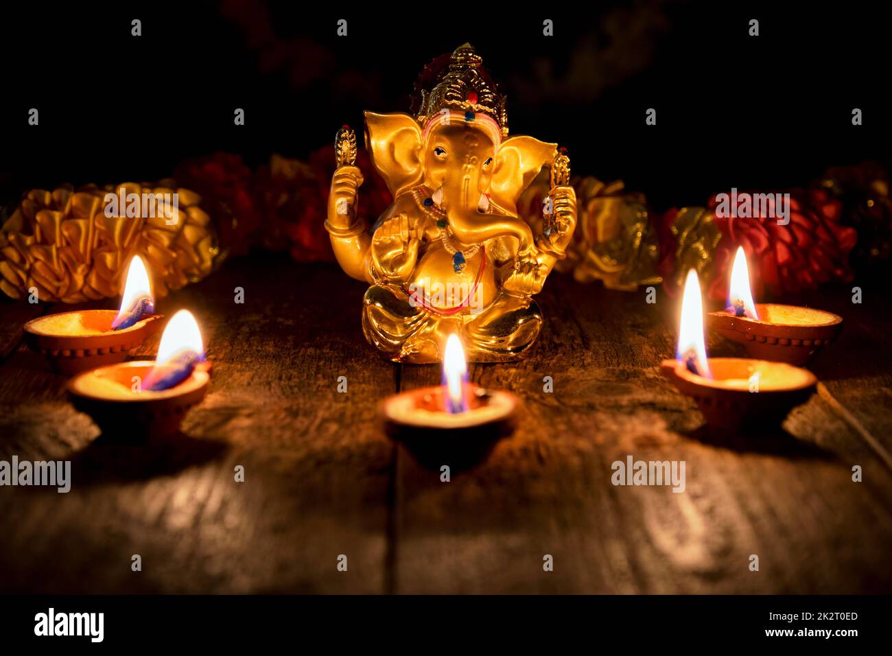 Ganesha with Diwali lights Stock Photo - Alamy