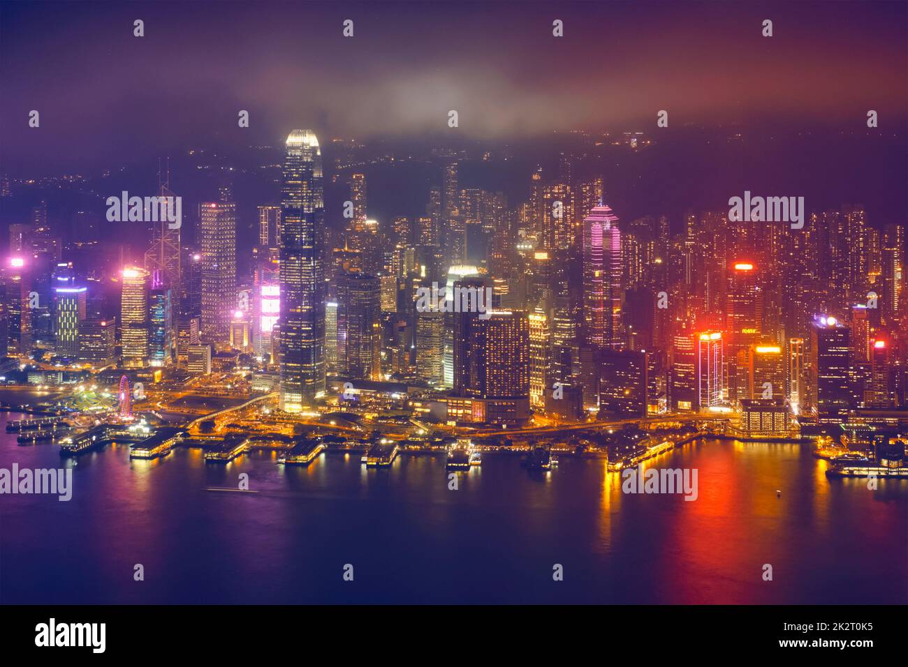 Aerial view of illuminated Hong Kong skyline. Hong Kong, China Stock ...