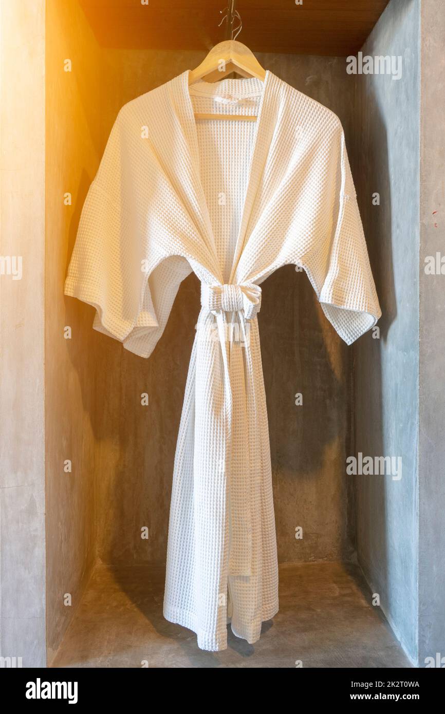 White robe in the Closet with cement background Stock Photo - Alamy