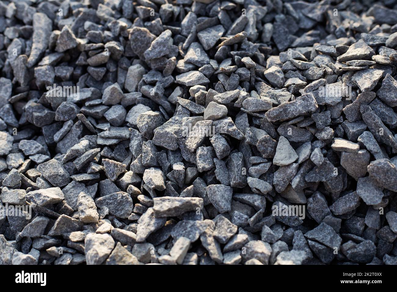 Stone, crushed stone texture background. Top view, close-up. Stone sea ...