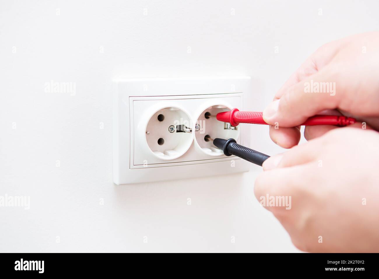 Measuring the voltage in the socket with a professional digital ...