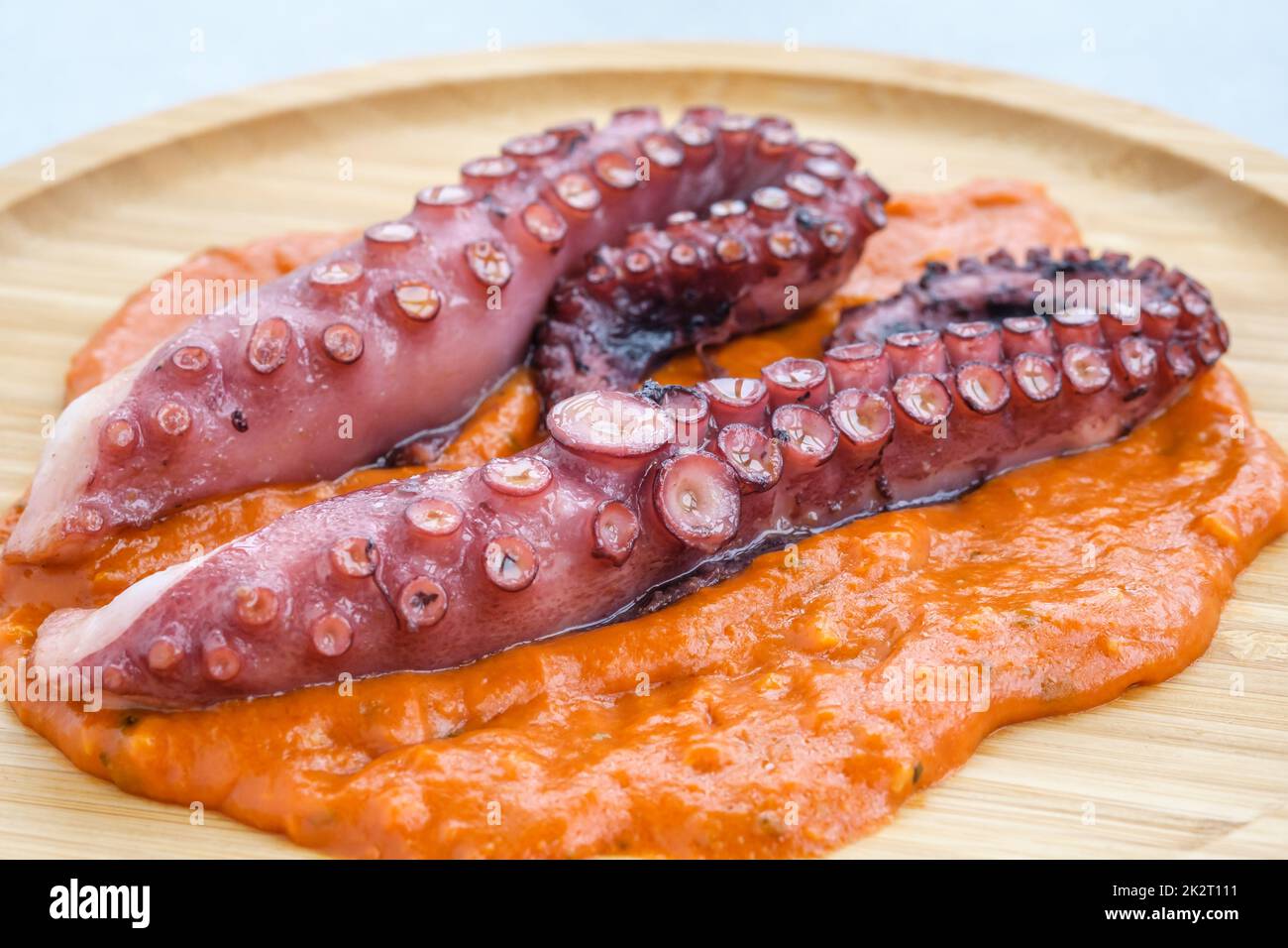 Octopus with romesco sauce Stock Photo - Alamy