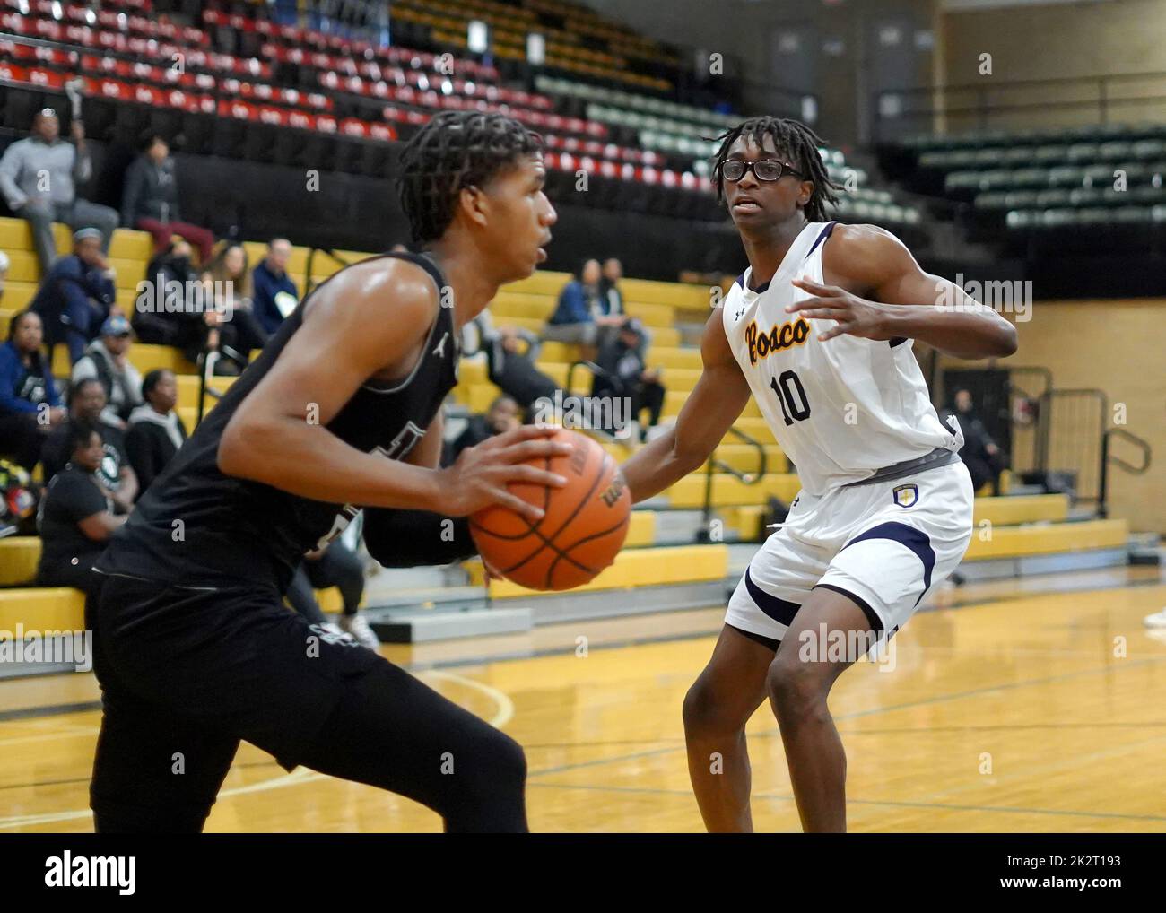 The African Americans playing basketball at Bosco vs United Prep game ...