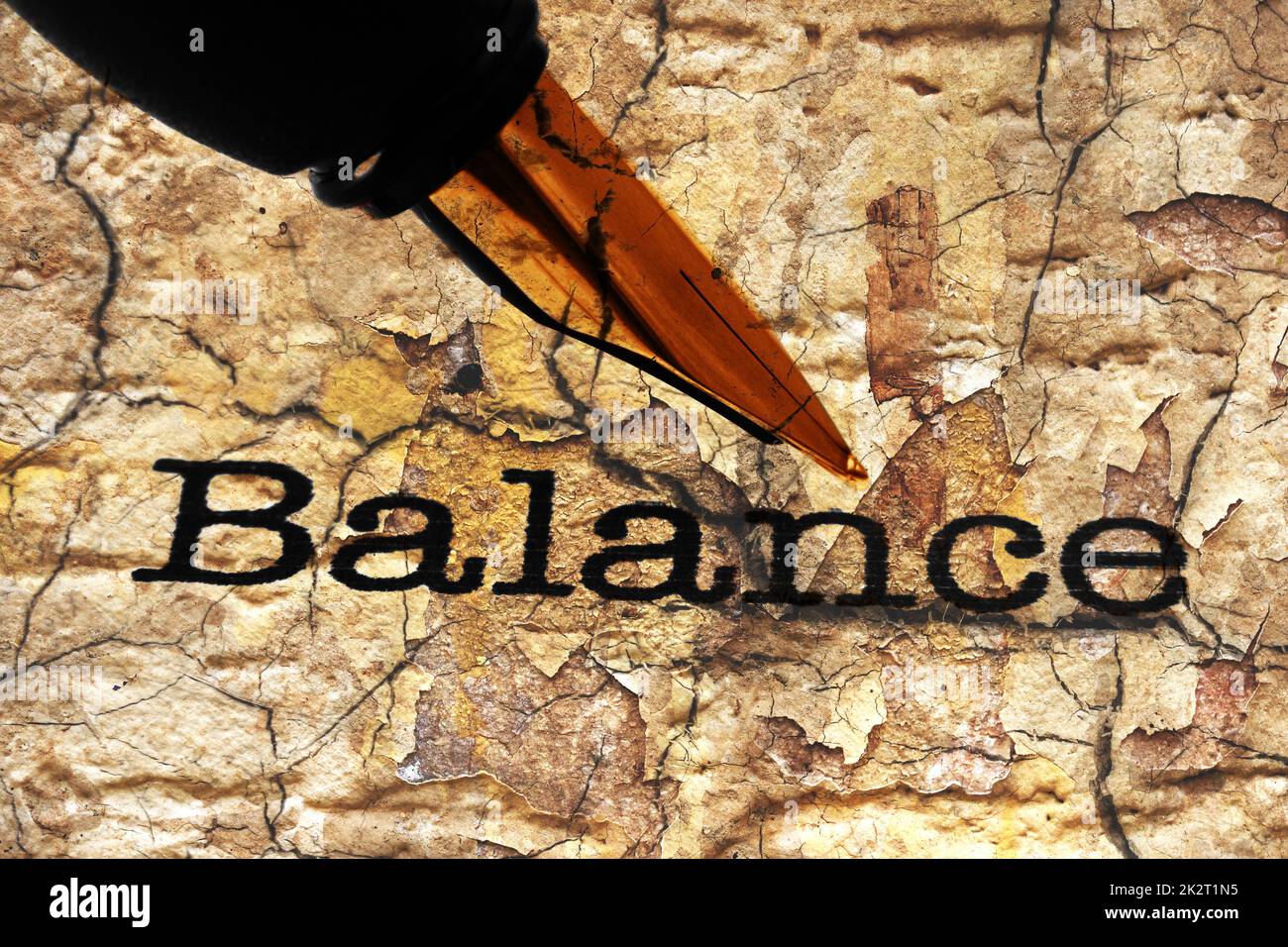 Fountain pen on balance text Stock Photo - Alamy