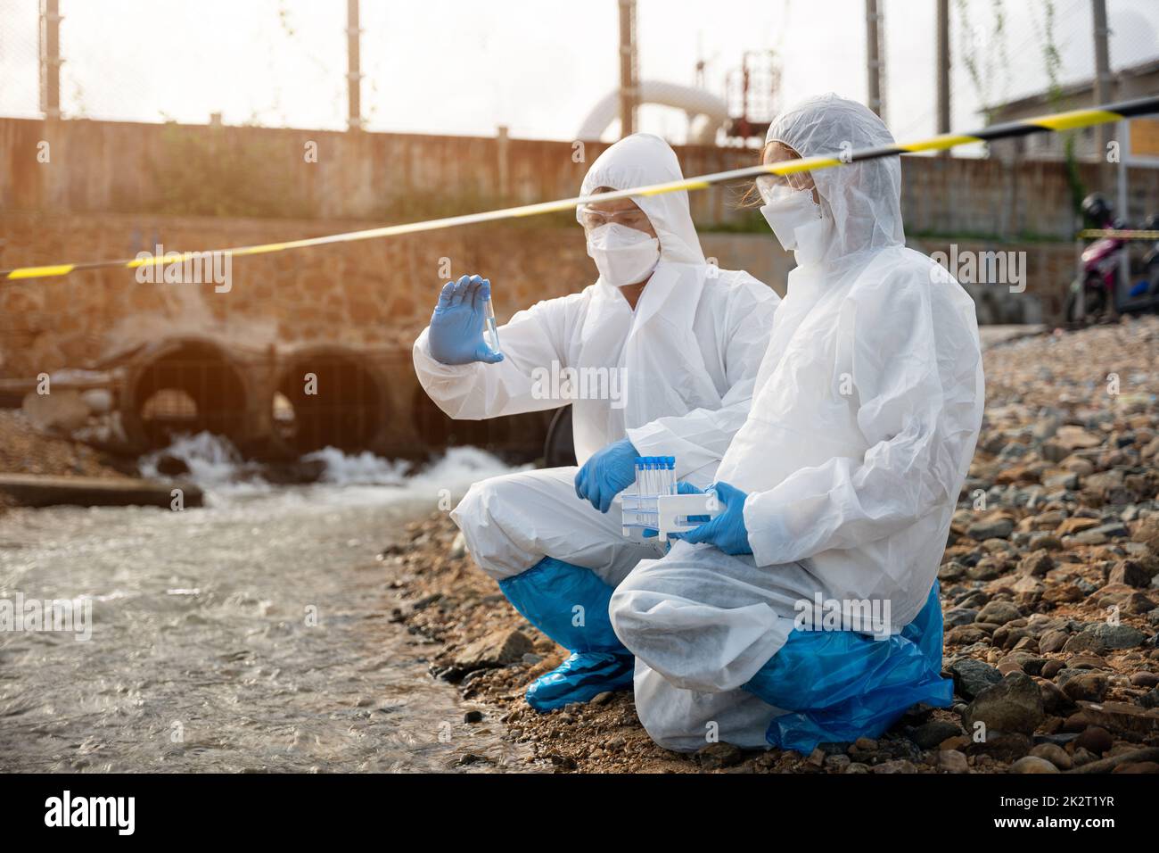 Ecologist sampling water from the river with test tube Stock Photo - Alamy