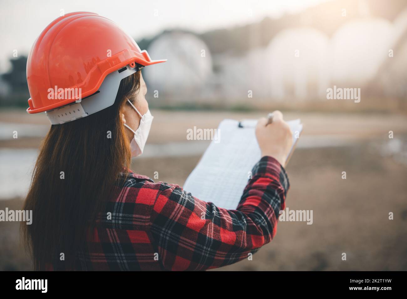Happy Asian worker woman in oil chemical industry worker working visual ...