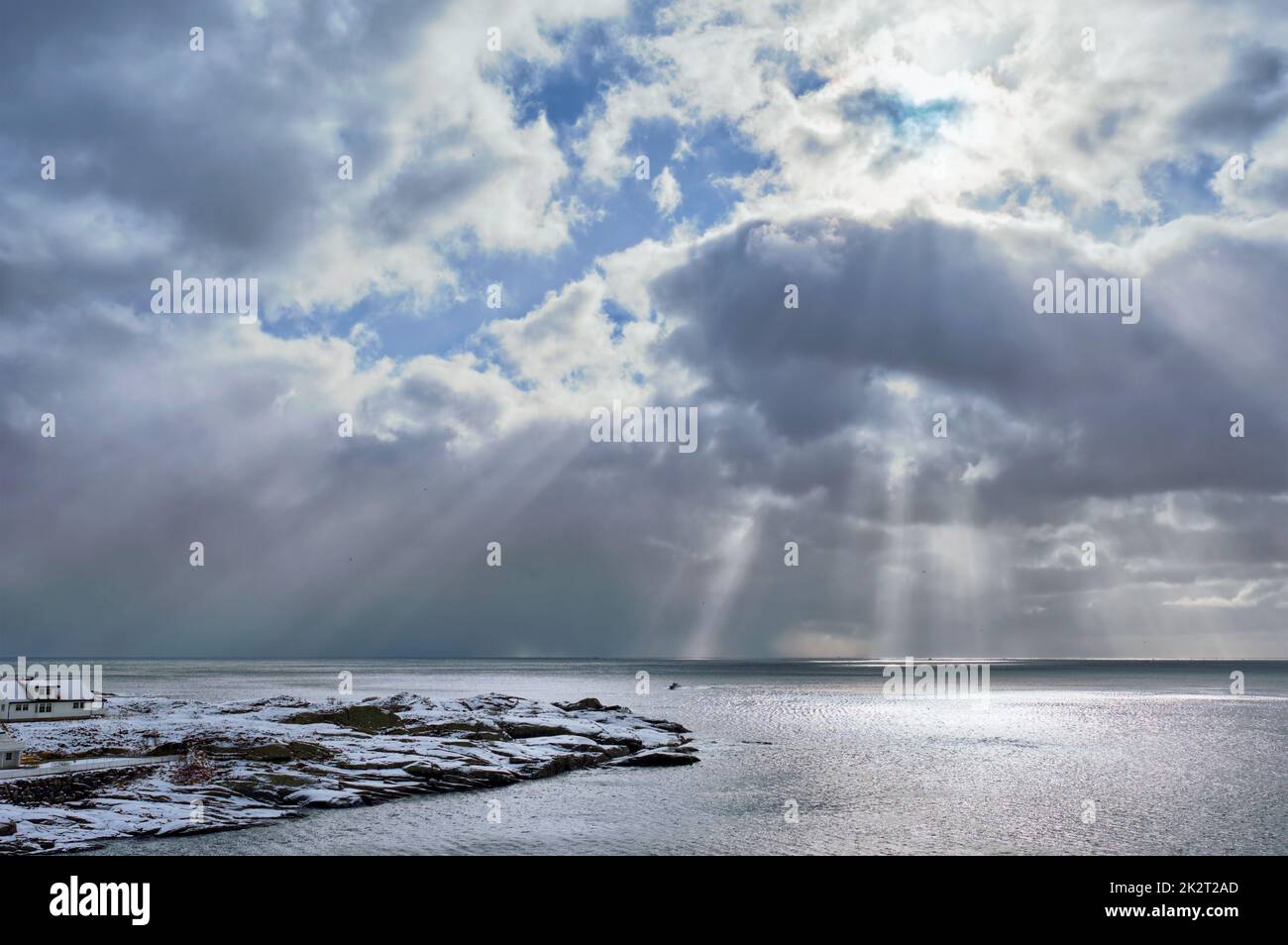 Norwegian sea in winter with sun rays Stock Photo - Alamy