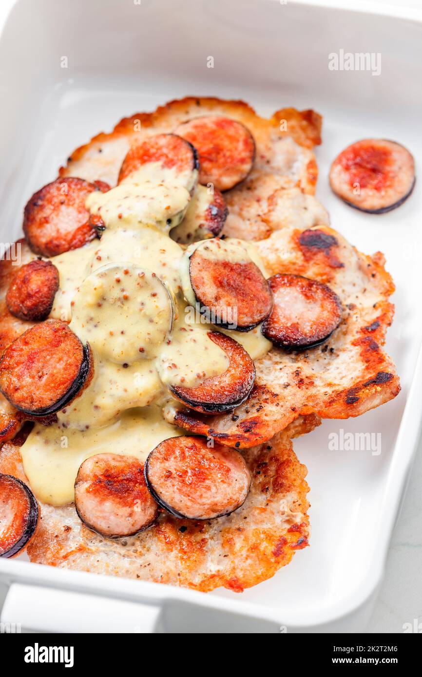 pork fillet with sausage and mustard sauce Stock Photo - Alamy