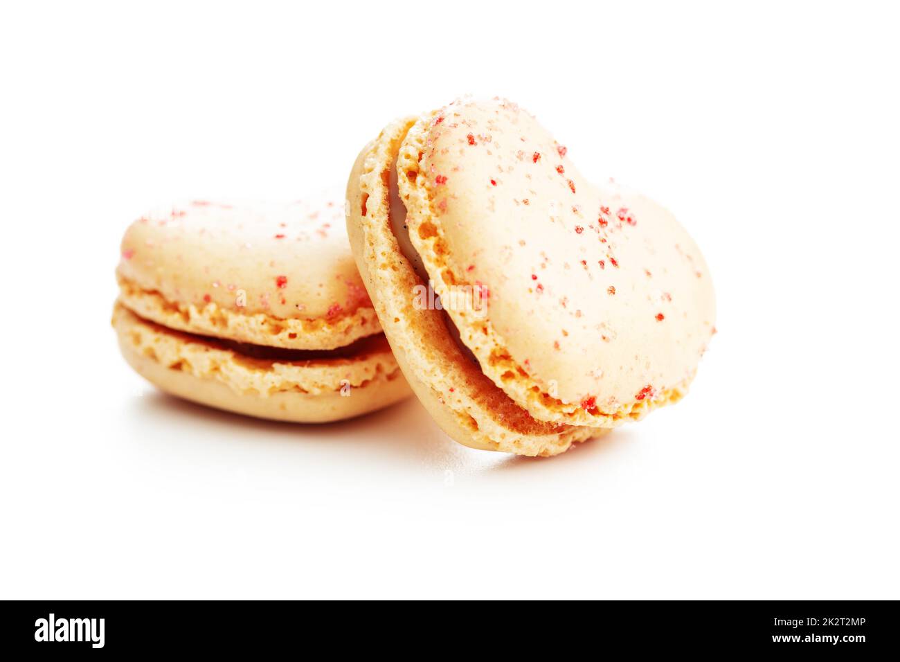 Heart shaped Sweet macarons isolated on white background Stock Photo ...