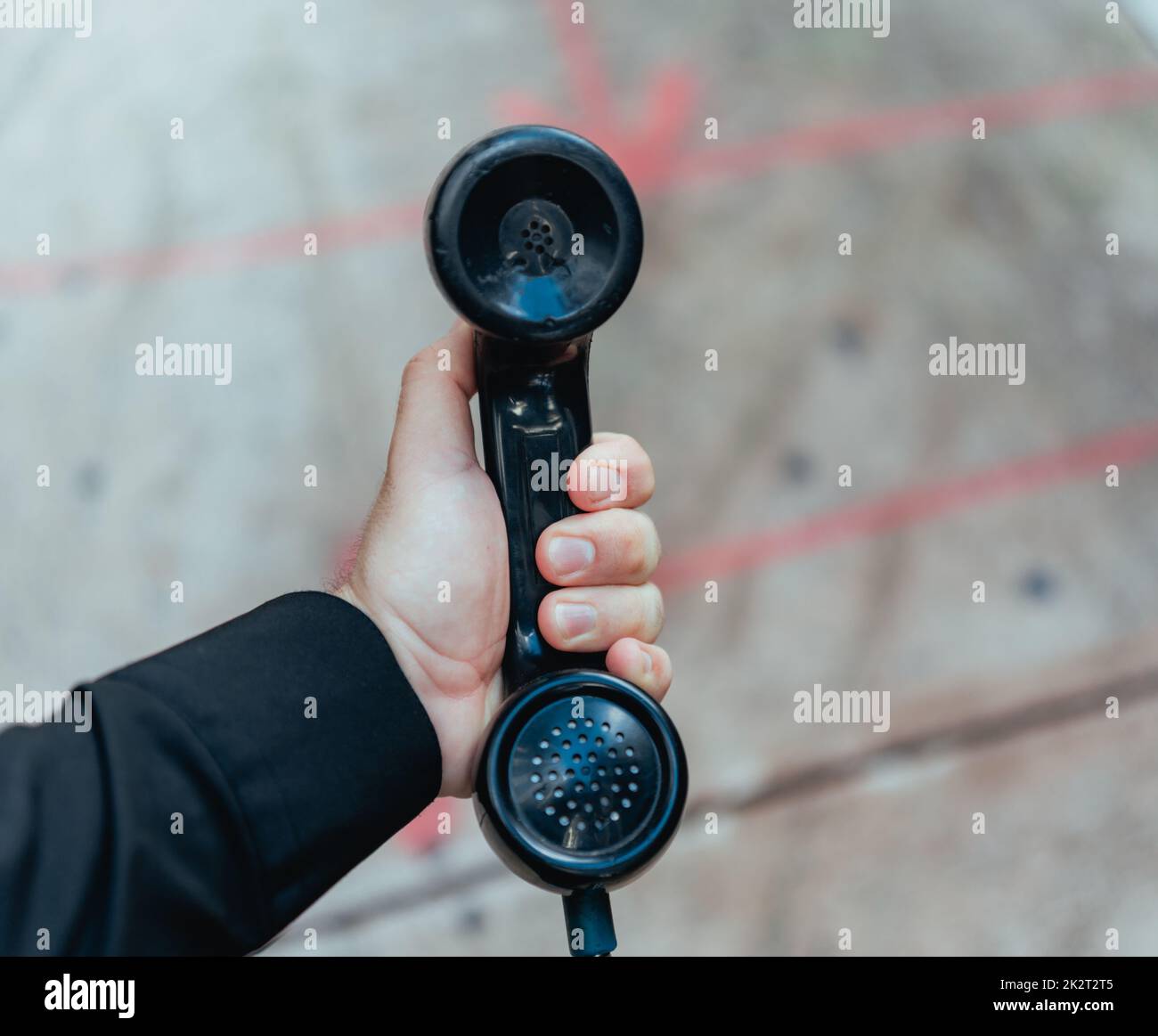 A human hand holding handset Stock Photo - Alamy