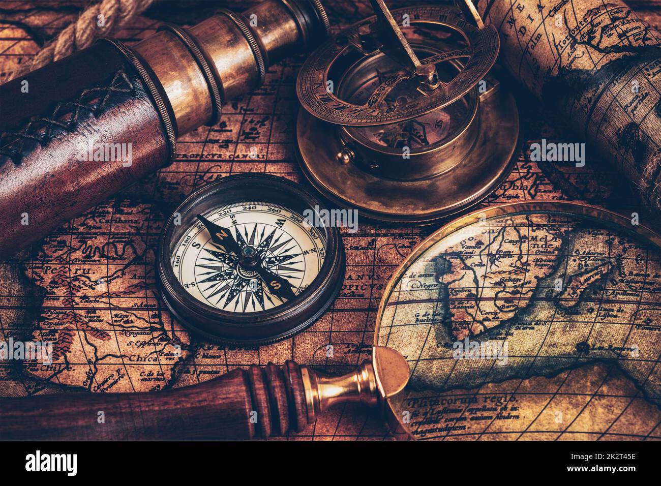 Old vintage compass on ancient map Stock Photo - Alamy
