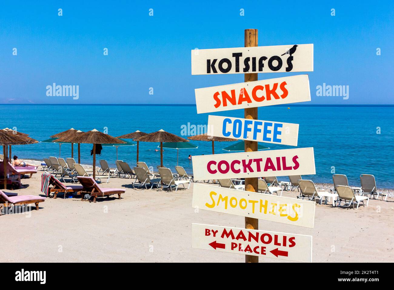 Snacks, coffee and cocktails sign on the beach at Rethymno or Rethymnon ...