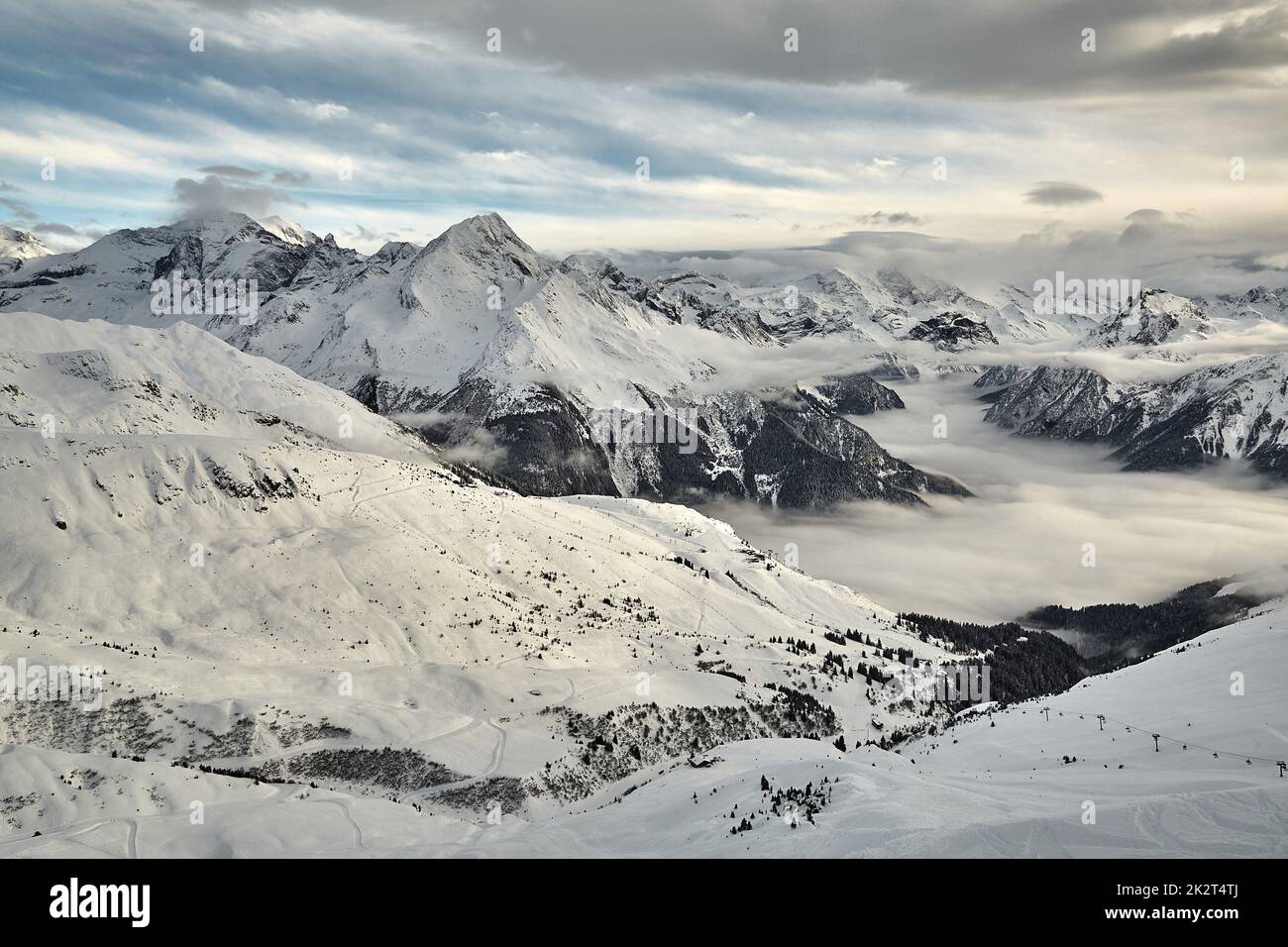 Clouds above snowy forest hi-res stock photography and images - Alamy