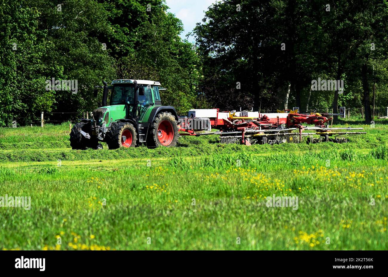 Equipment hay tedder tractor hi-res stock photography and images - Alamy