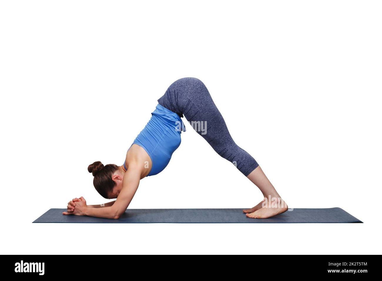 Woman doing Hatha yoga asana Ardha Pincha Mayurasana Stock Photo - Alamy